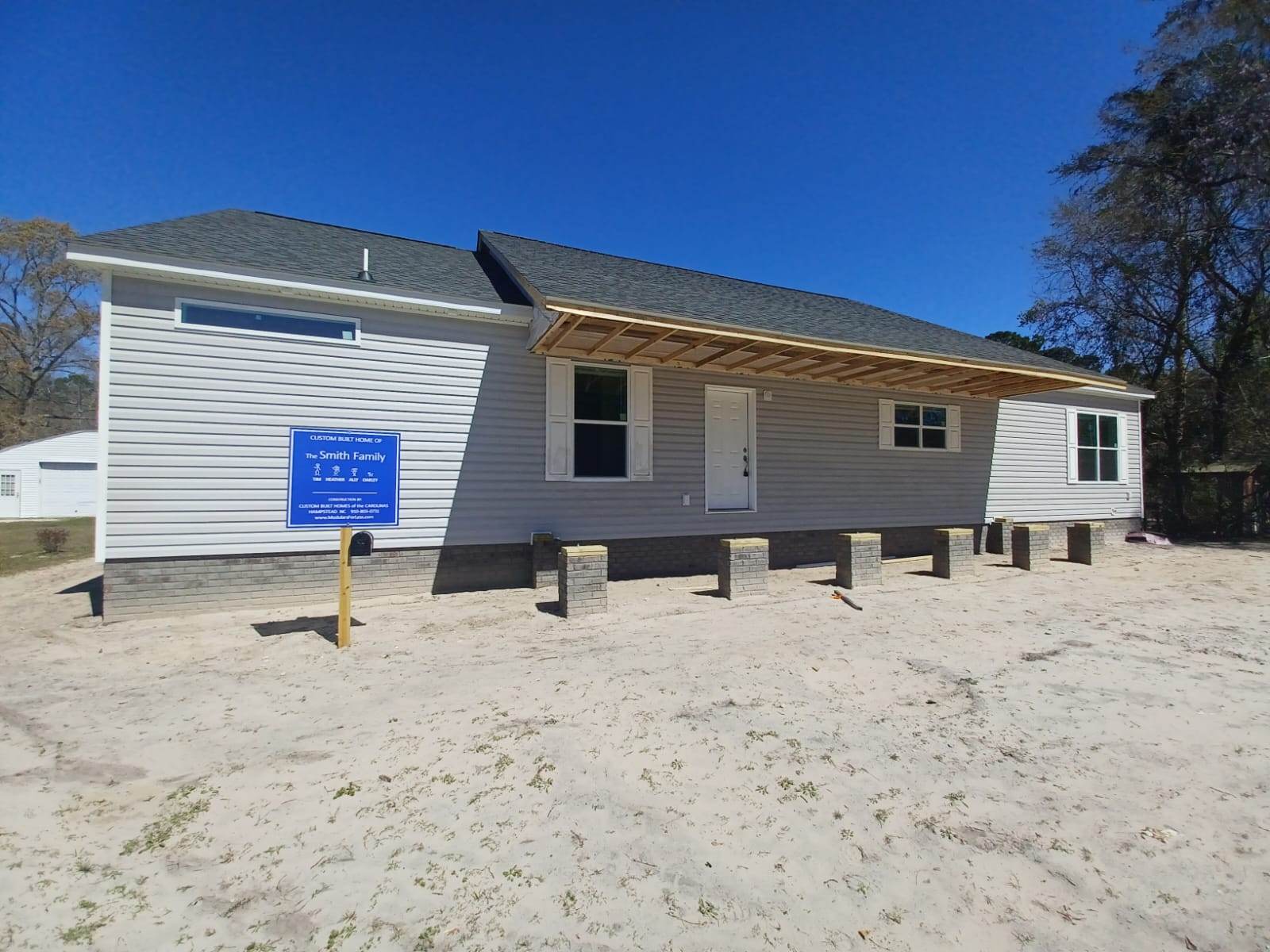 New Home With Saddle Roof!