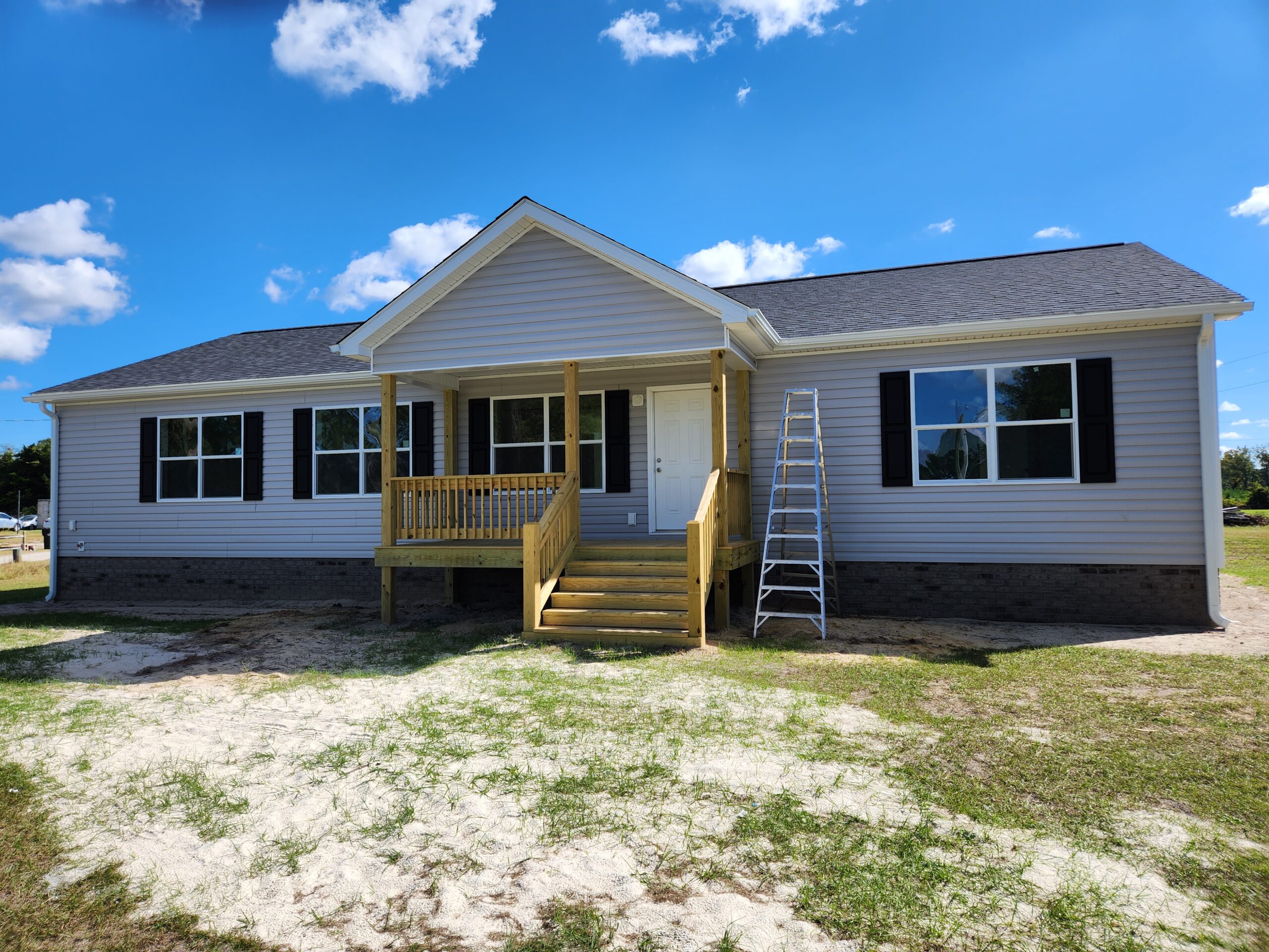 Porch Up & Gutters Installed!